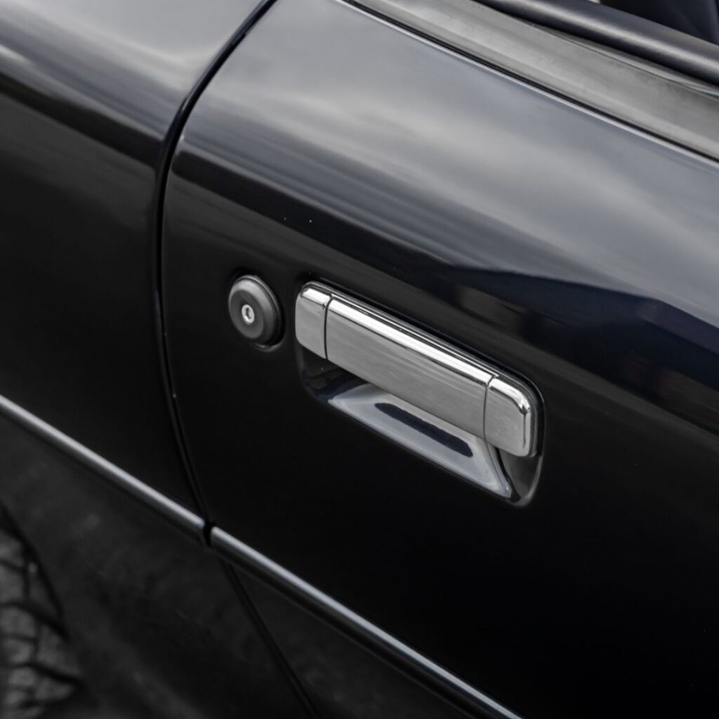 DB7 Vantage Right Side Door Lock Shield Assembly